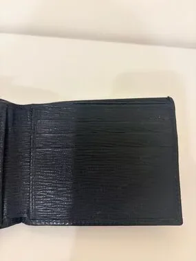 Salvatore Ferragamo | Bags | Salvatore Ferragamo Black Leather Bifold ...